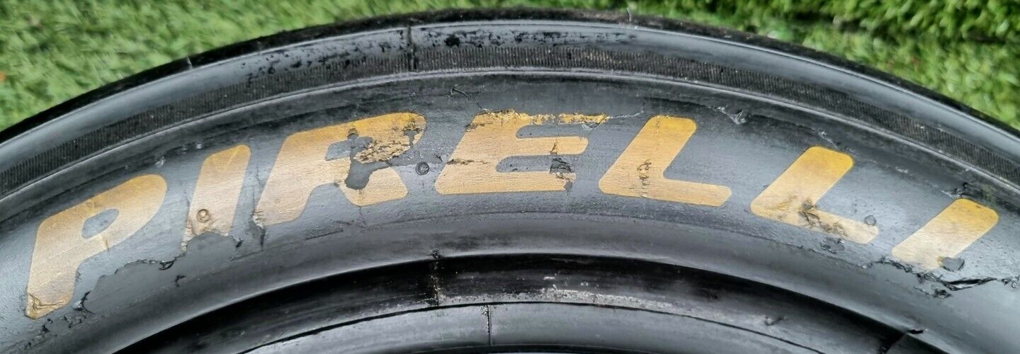 Pirelli F1 Racing Slick Tyre Coffee Table With Mirrored Glass Top – Tyretek